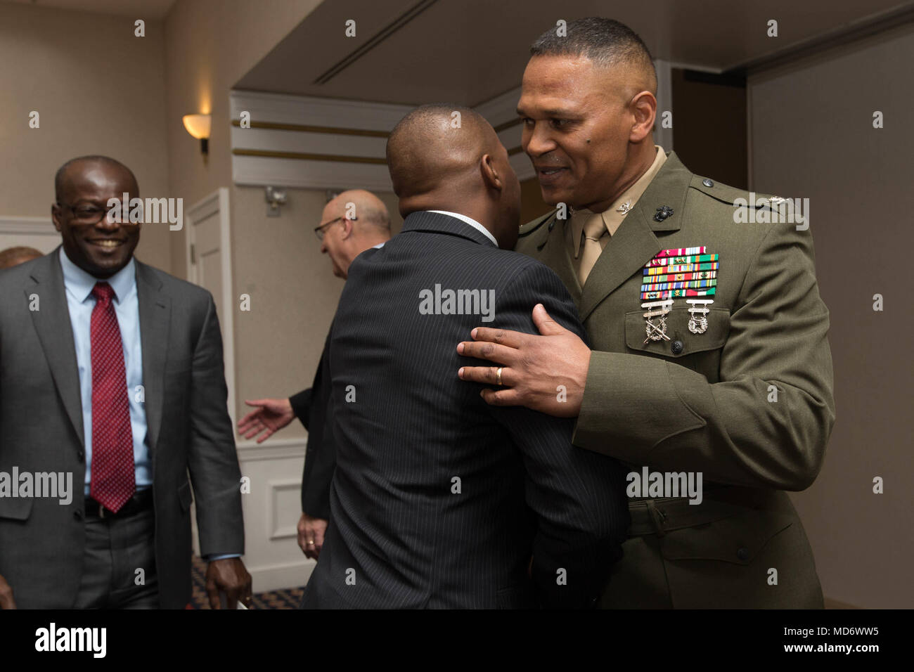 Attendees of U.S. Marine Corps Col. Ronald Jones, chief of behavioral ...