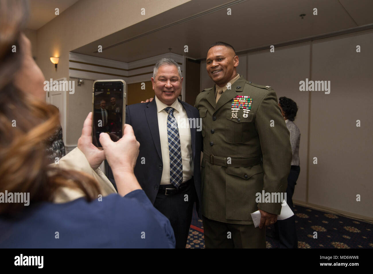 Attendees of U.S. Marine Corps Col. Ronald Jones, chief of behavioral ...
