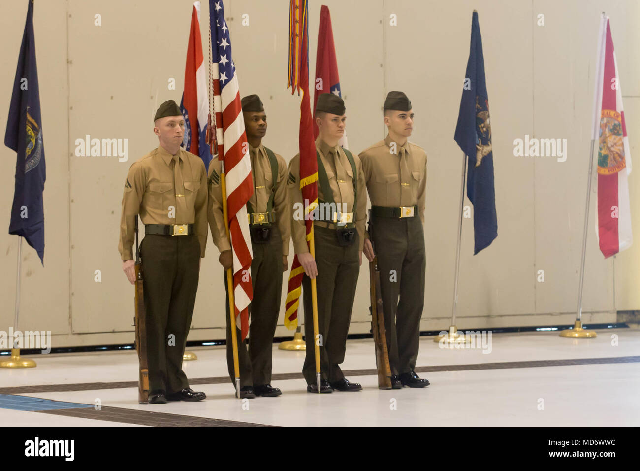 U.S. Marines with the Marine Helicopter Squadron One (HMX-1) stand at ...