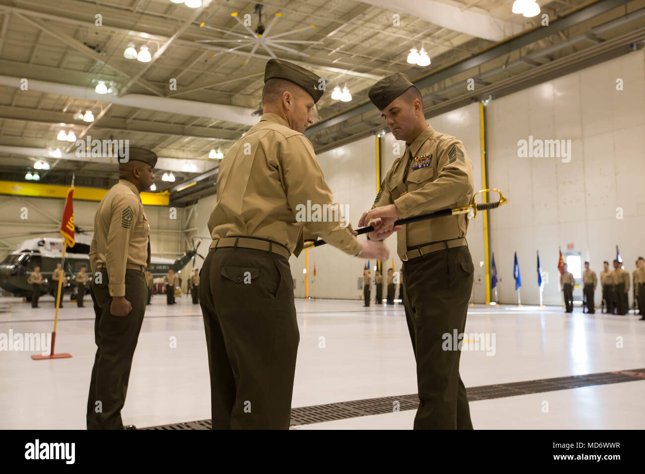 U.S. Marine Corps Sgt. Maj. Sean Cox, right, incoming sergeant major ...