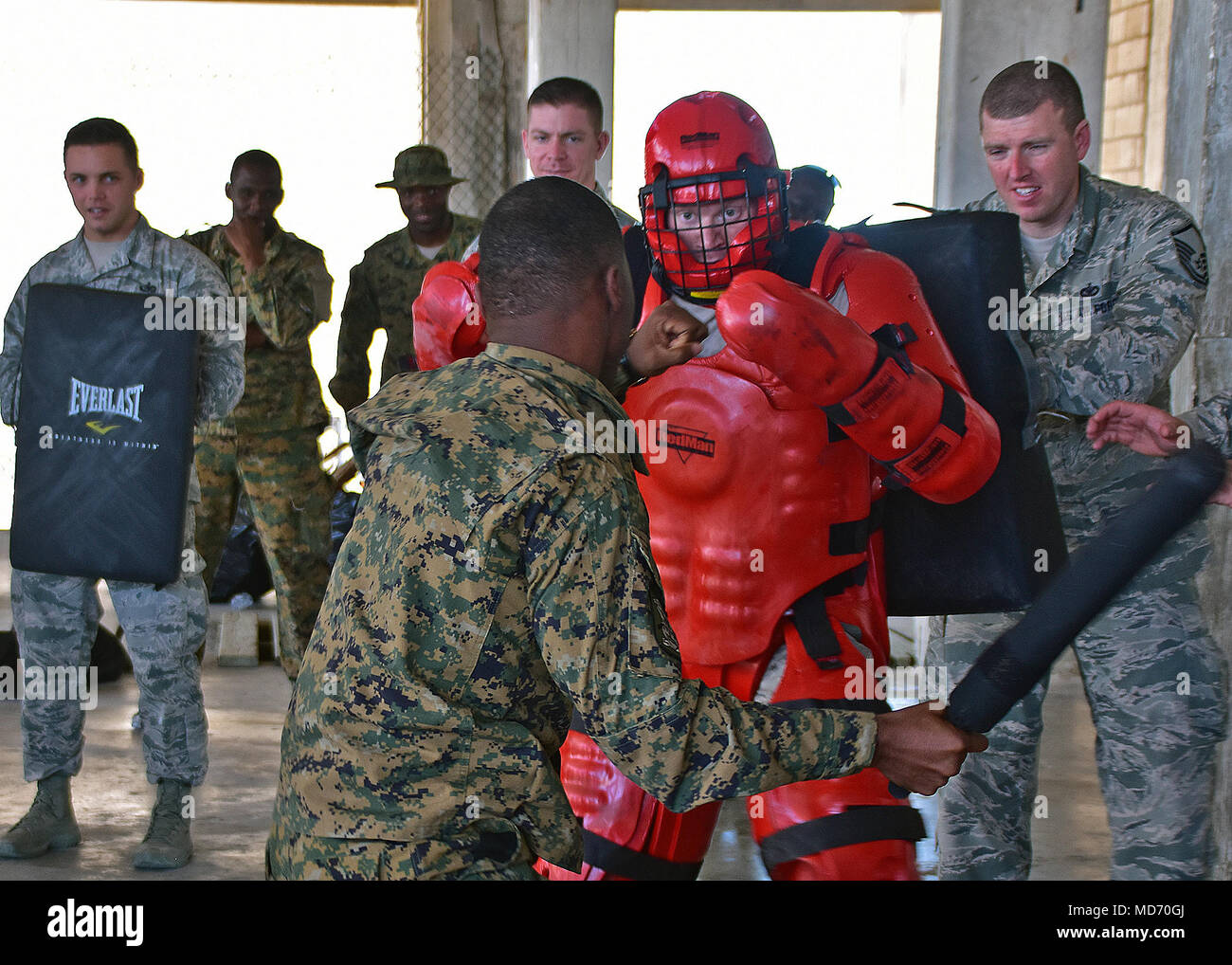A member of the Royal Bahamas Defence Force participates in baton ...