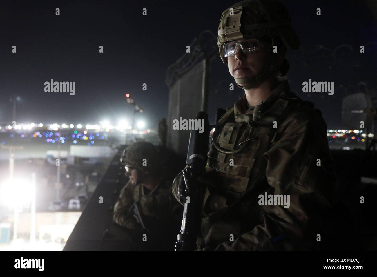 Spc. Elizabeth White (right), a public affair specialist, and Spc ...
