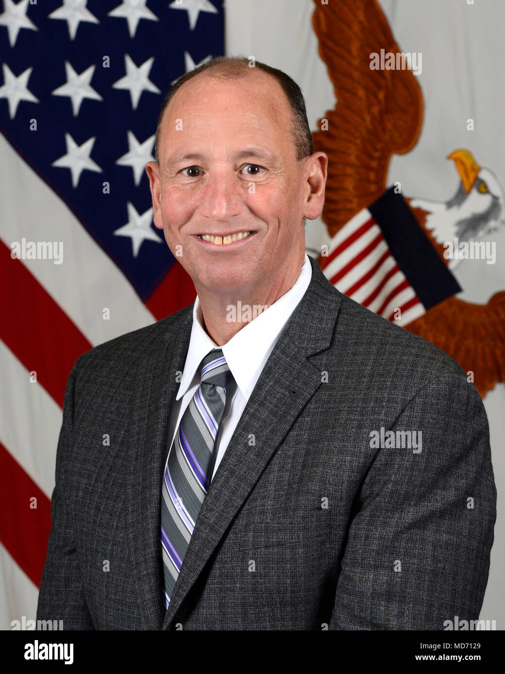 Kevin M. Fahey, Assistant Secretary of Defense (Aquisition), poses for ...