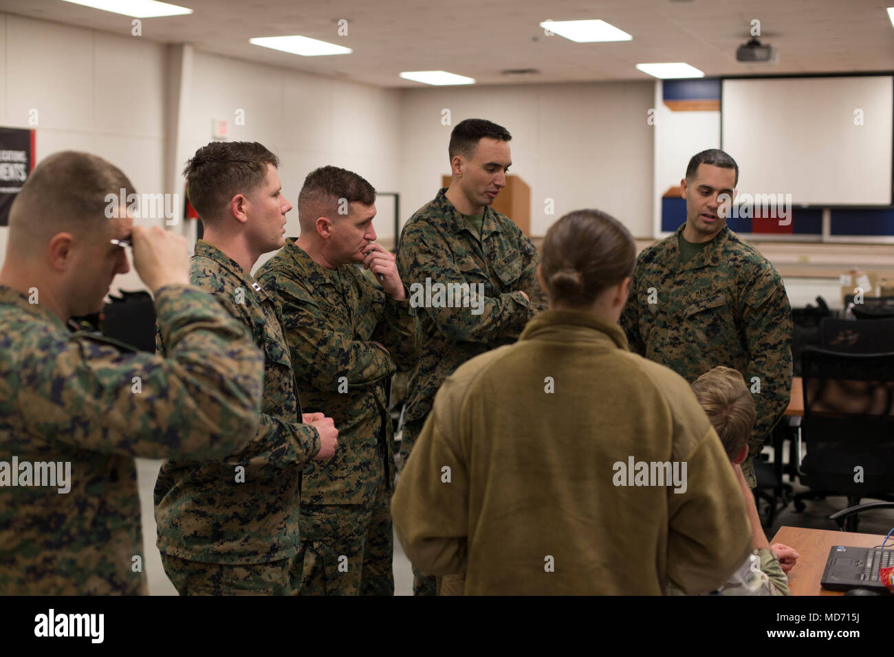 U.S. Marines and a U.S. Airmen go over the planning phase in the ...