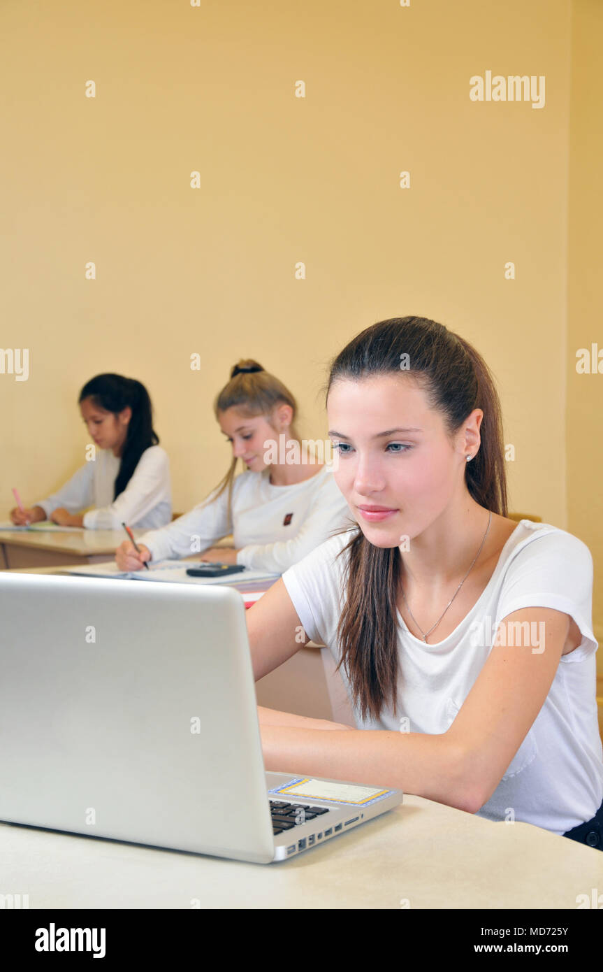 Teenage students classroom uniform hi-res stock photography and images ...