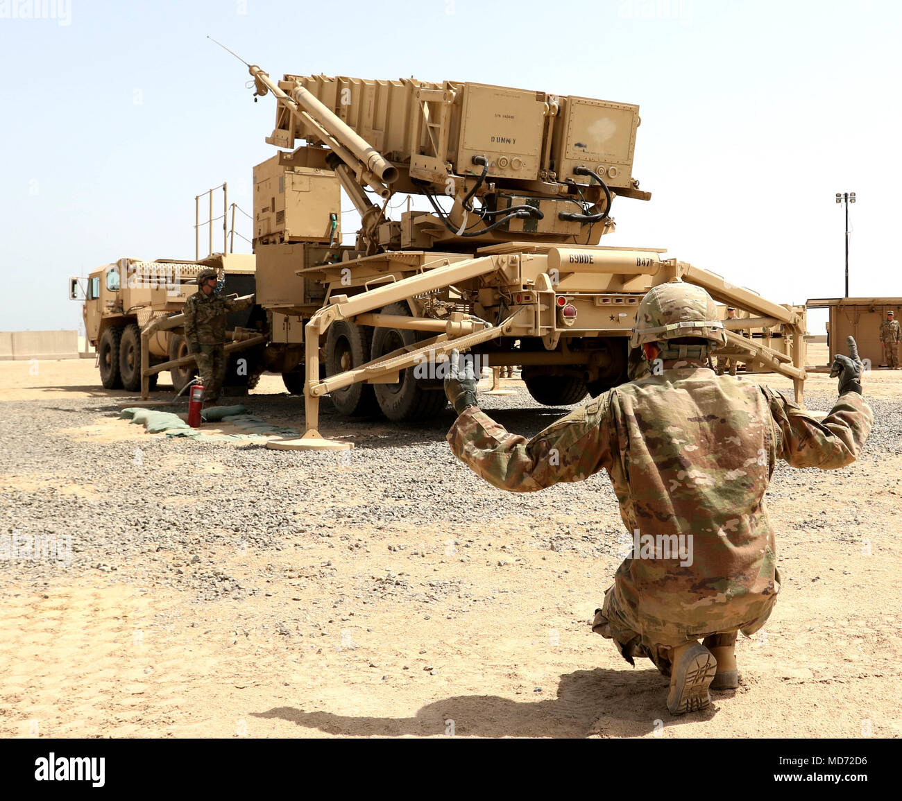 CAMP ARIFJAN, Kuwait – Pfc. Cuong Ngo, a patriot fire control enhanced ...