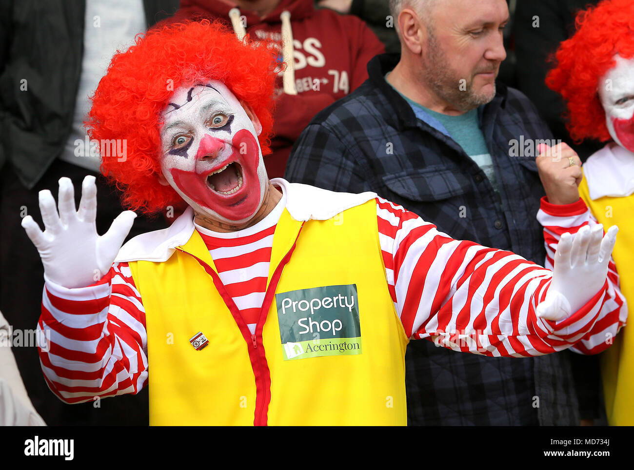 A clown poses for a picture prior to the match Stock Photo - Alamy