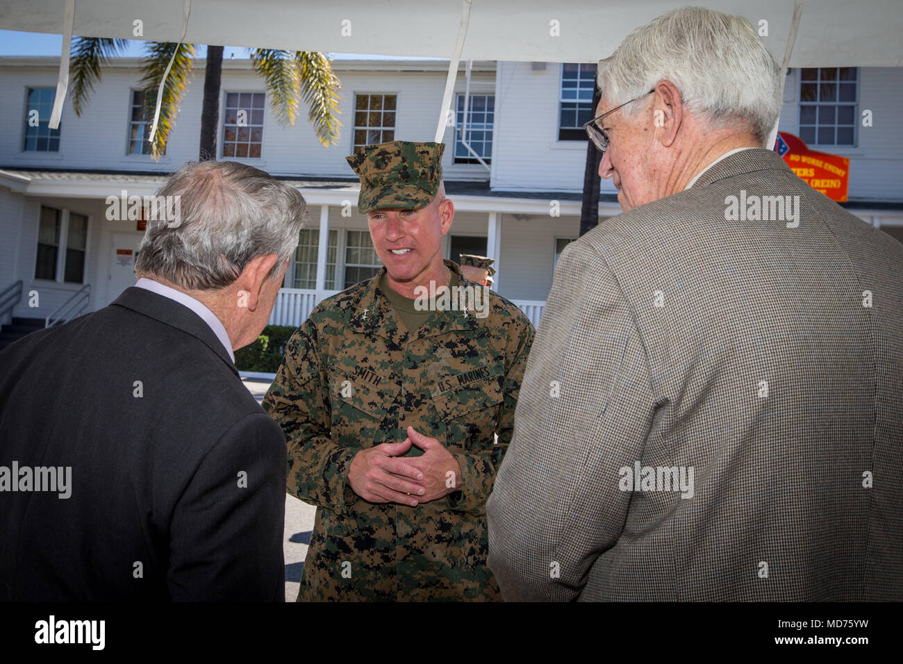 U.S. Marine Corps Maj. Gen. Eric Smith, center, the commanding general ...
