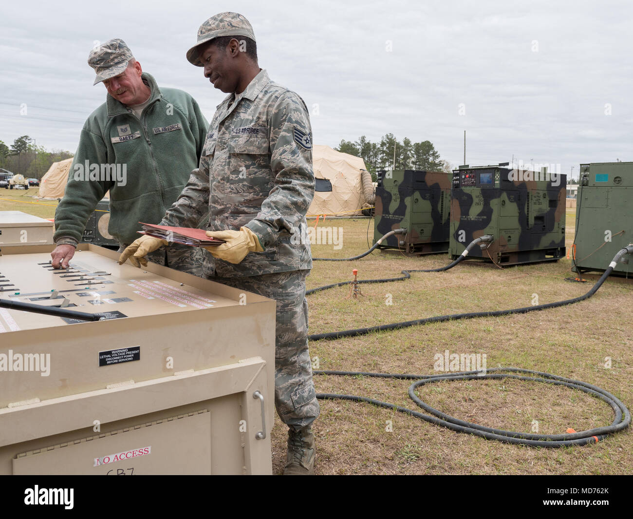 U.S. Air Force Tech. Sgt. Timothy Bailey, left, and Staff Sgt. Matthew ...