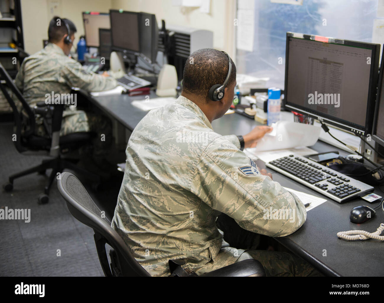 Members from the 18th Wing Security Forces Squadron work as base ...