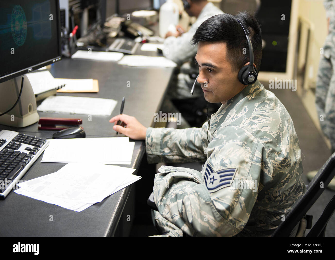 U.S. Air Force Staff Sgt. Ronald Cruz works as a base defense ...