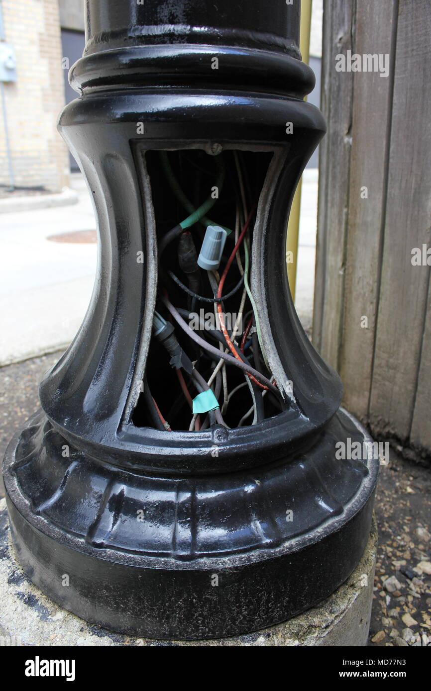 Exposed inside wires of a street light Stock Photo - Alamy
