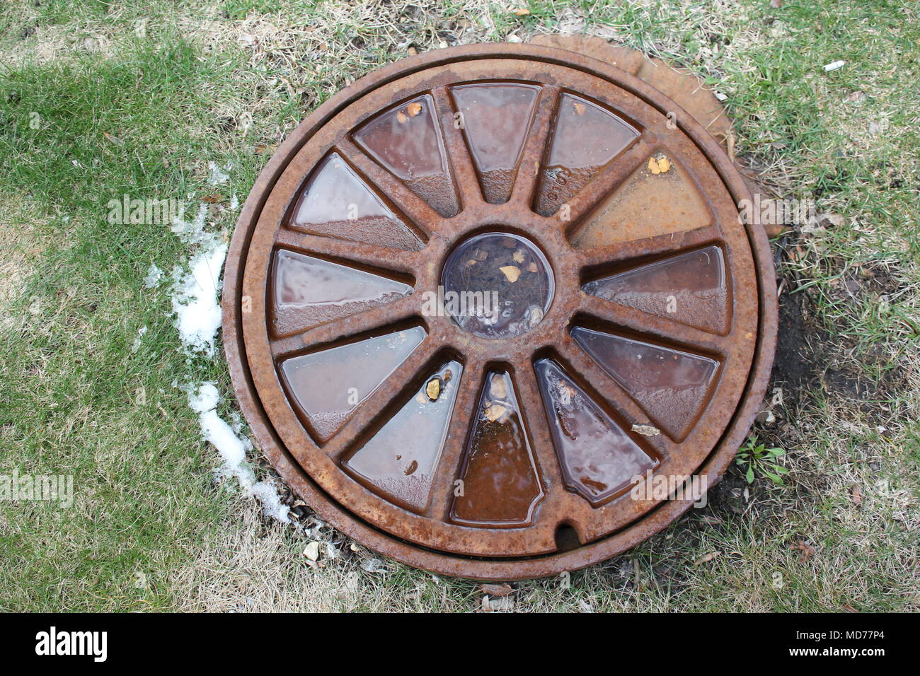 Decorative manhole cover for access to underground utilities Stock ...