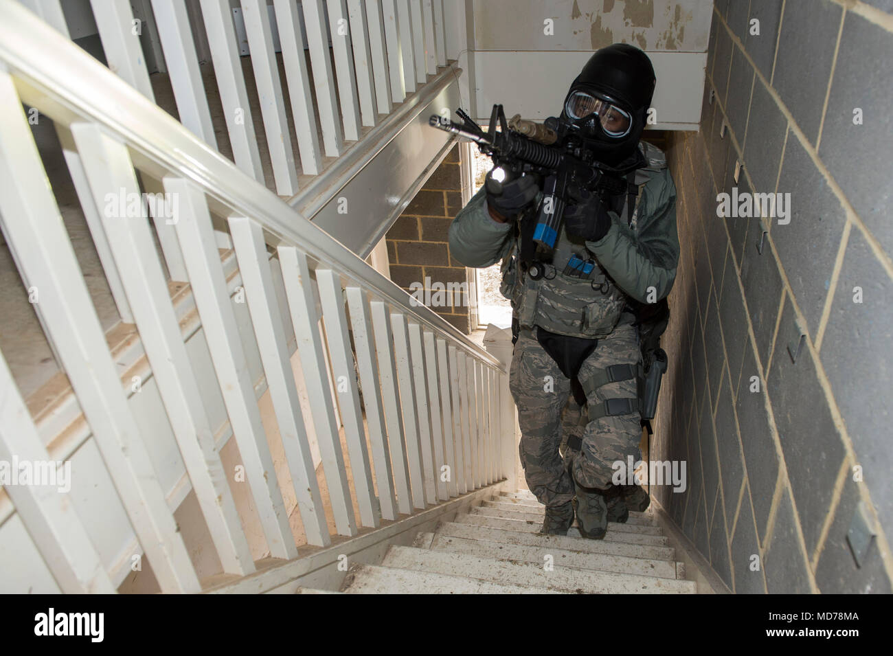 Airmen with the 422nd Security Forces Squadron participate in a force ...