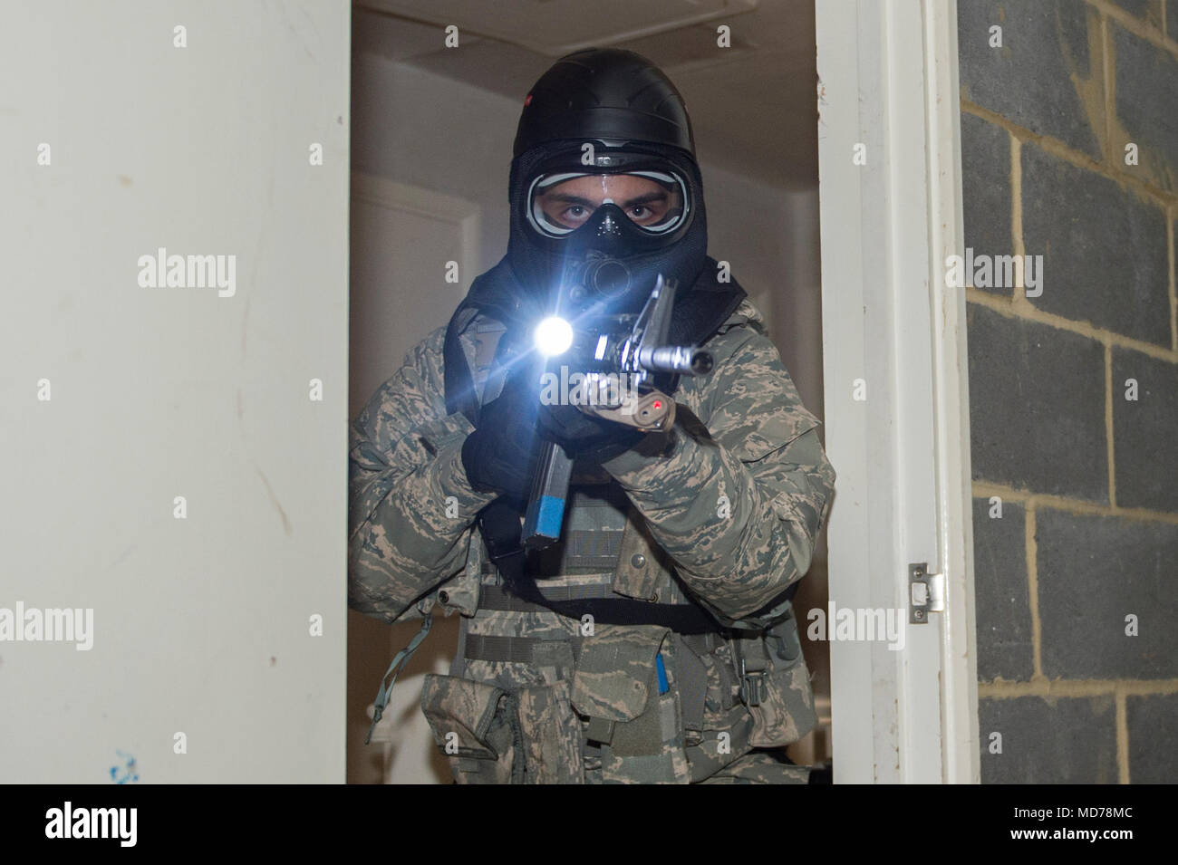 Airmen with the 422nd Security Forces Squadron participate in a force ...