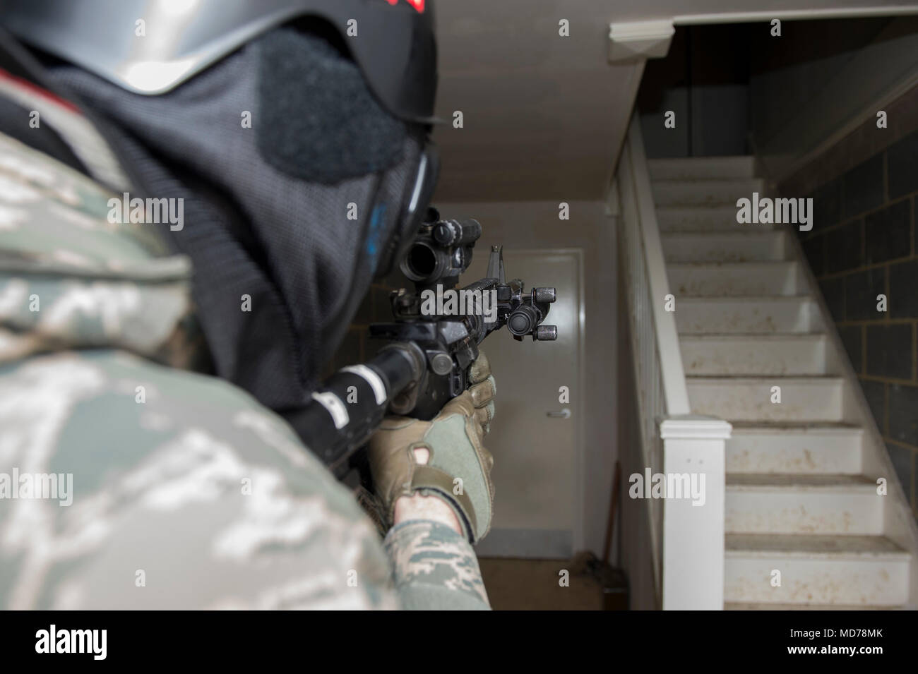 Airmen with the 422nd Security Forces Squadron participate in a force ...