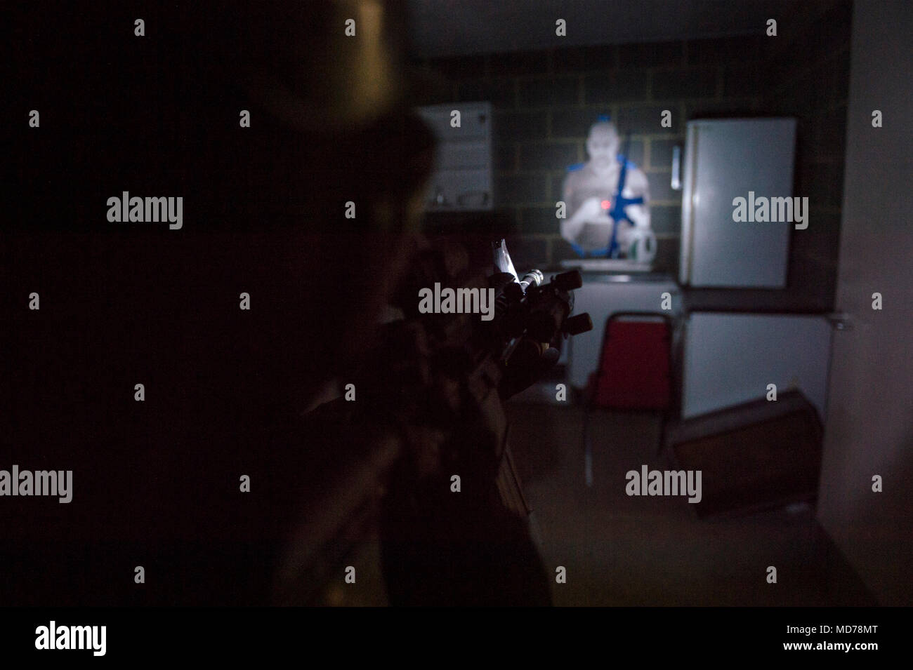 Airmen with the 422nd Security Forces Squadron participate in a force ...