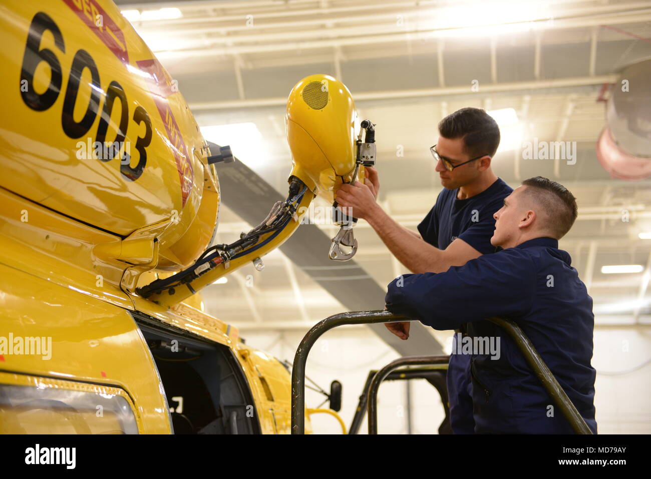 Petty Officer 2nd Class Stewart Esham and Petty Officer 3rd Class Mike ...