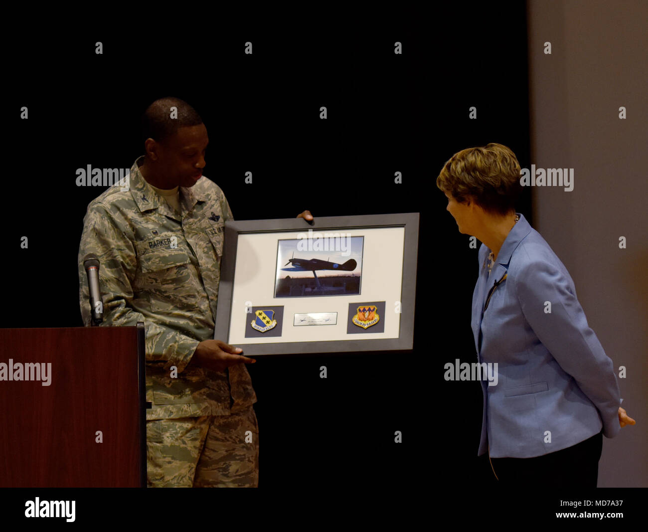 U.S. Air Force Col. Brandon Parker, 7th Bomb Wing commander, gifts Col ...
