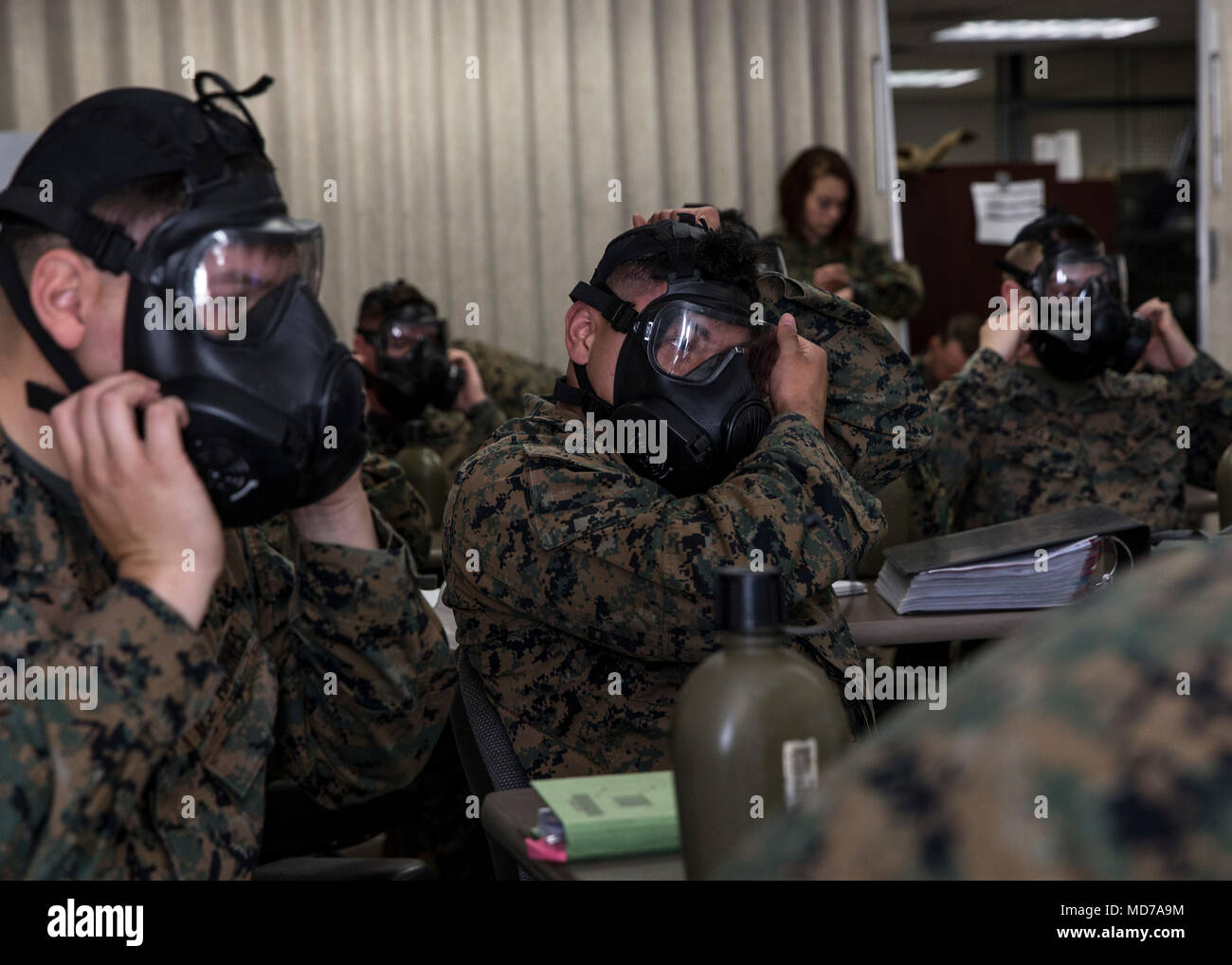 Marines with 3rd Marine Aircraft Wing adjust the fit of M50 Joint ...