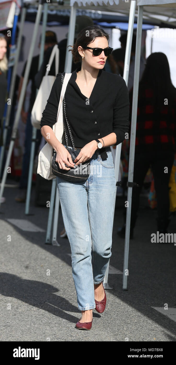 Phoebe Tonkin sports her model like frame around the Farmers Market in ...