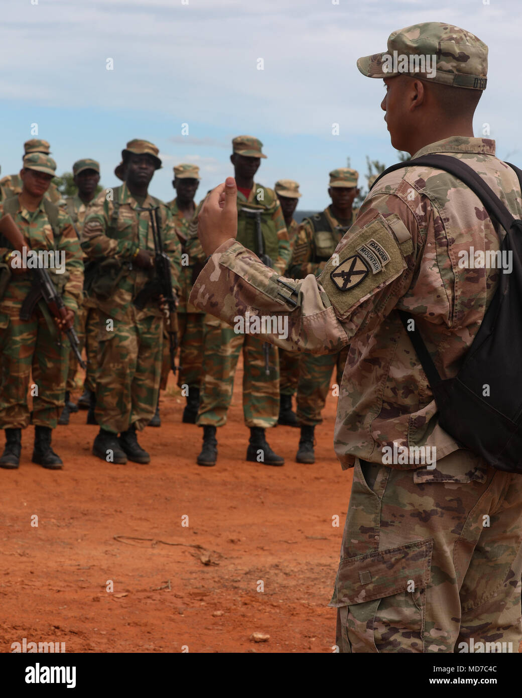Sgt. 1st Class Travis O'Guin, an infantryman assigned to 1st Battalion ...