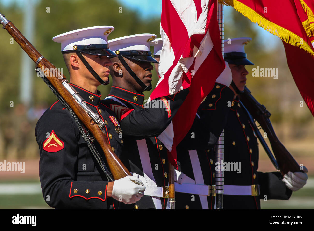 The U.S. Marine Corps Color Guard carries the National and U.S. Marine ...