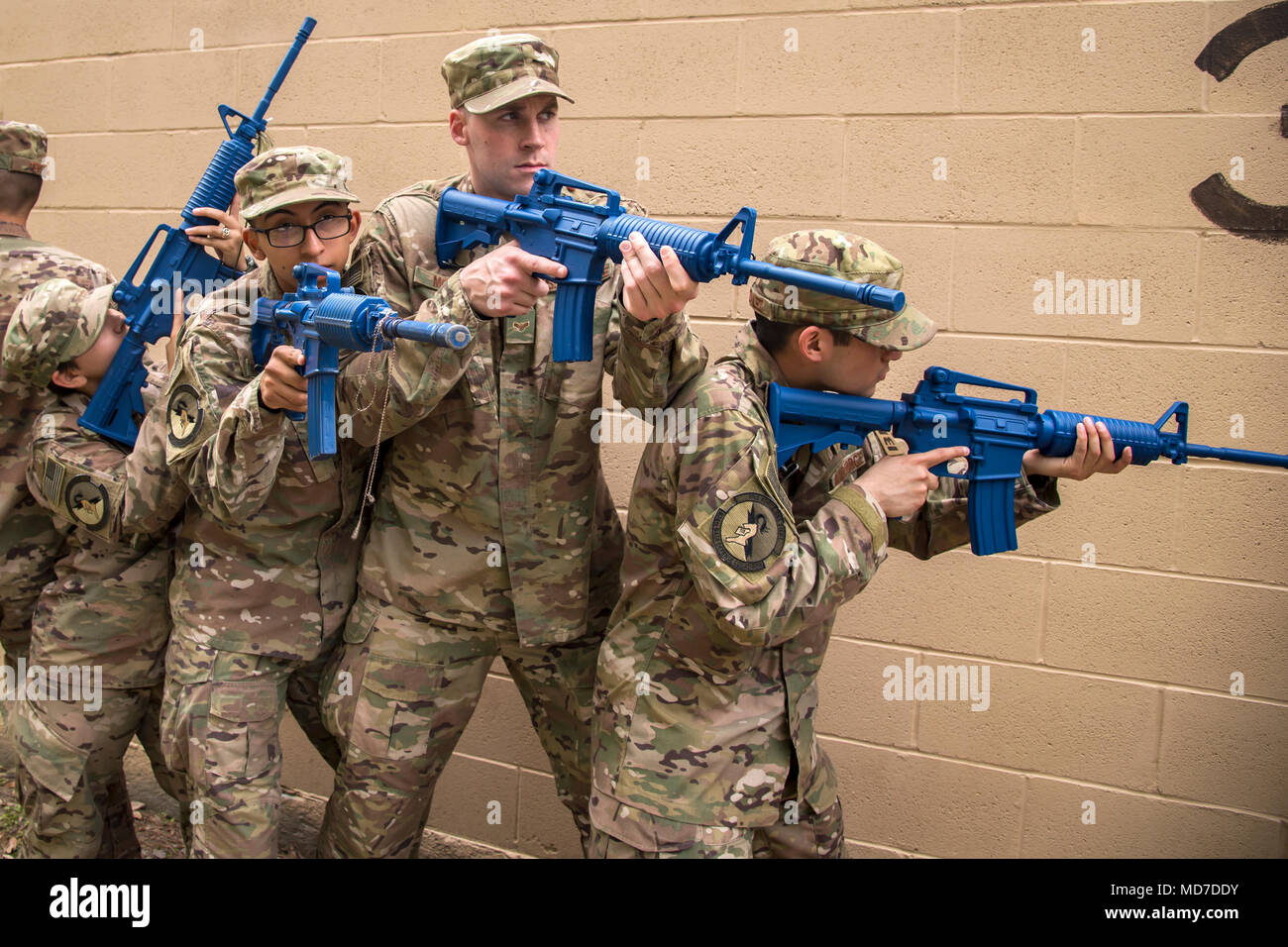 Airmen from the 820th Base Defense Group (BDG) secure their position ...