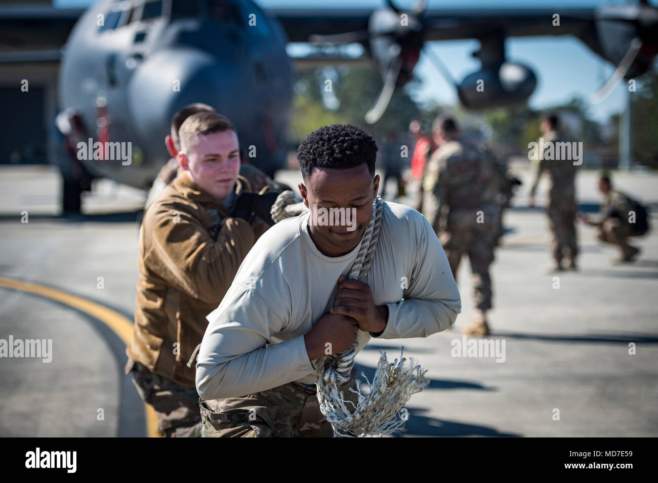 Airmen from the 71st Aircraft Maintenance Unit pulls an HC-130J Combat ...