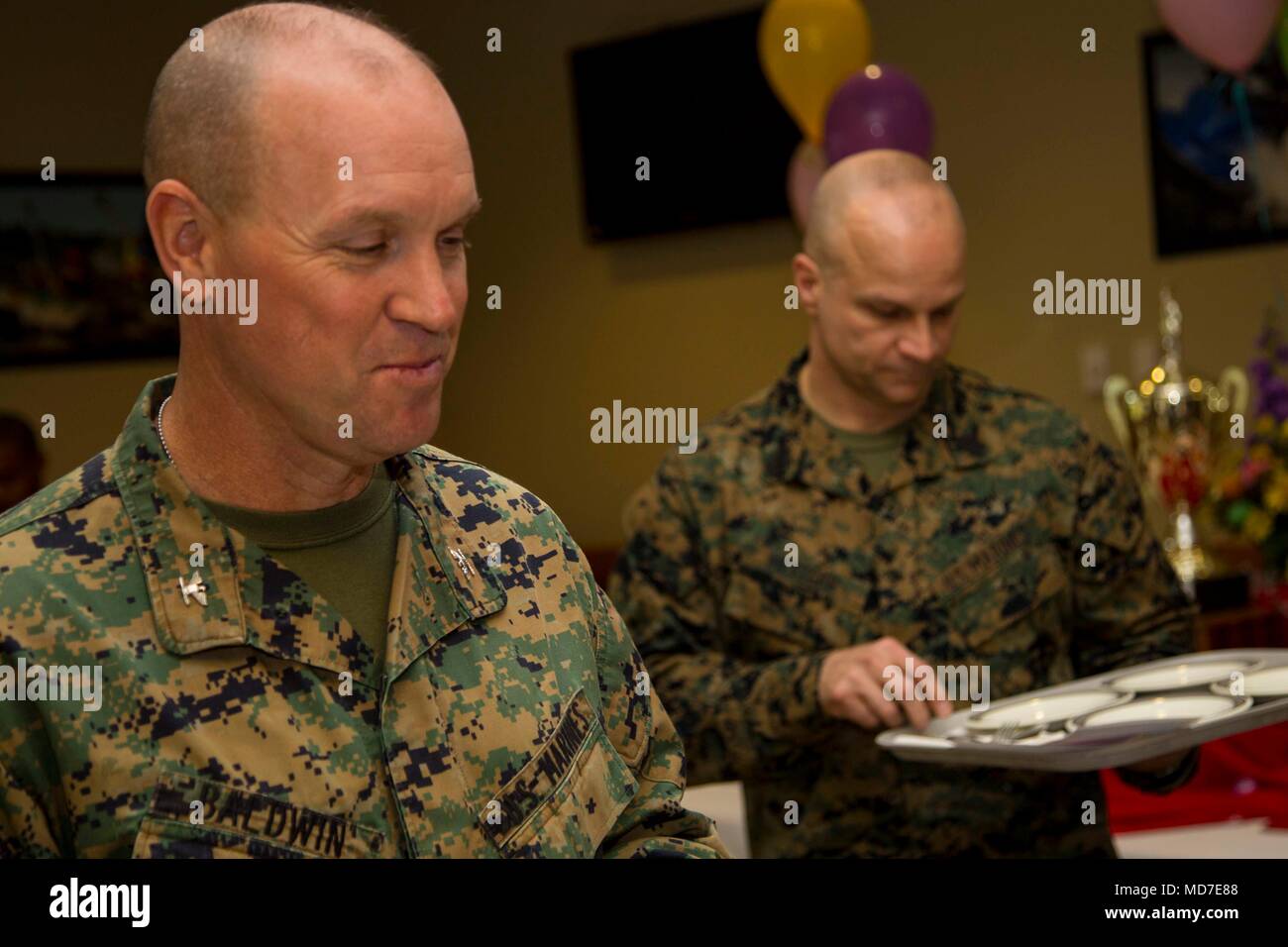 Col. Scott Baldwin, left, logistics officer, Marine Corps Installations ...
