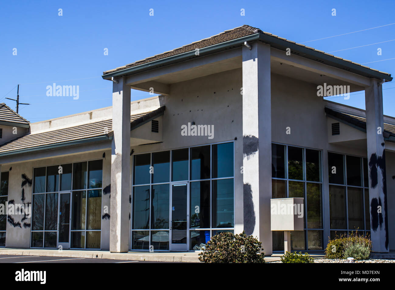 Vacant Corner Commercial Store Fronts In Need Of Repair Stock Photo - Alamy