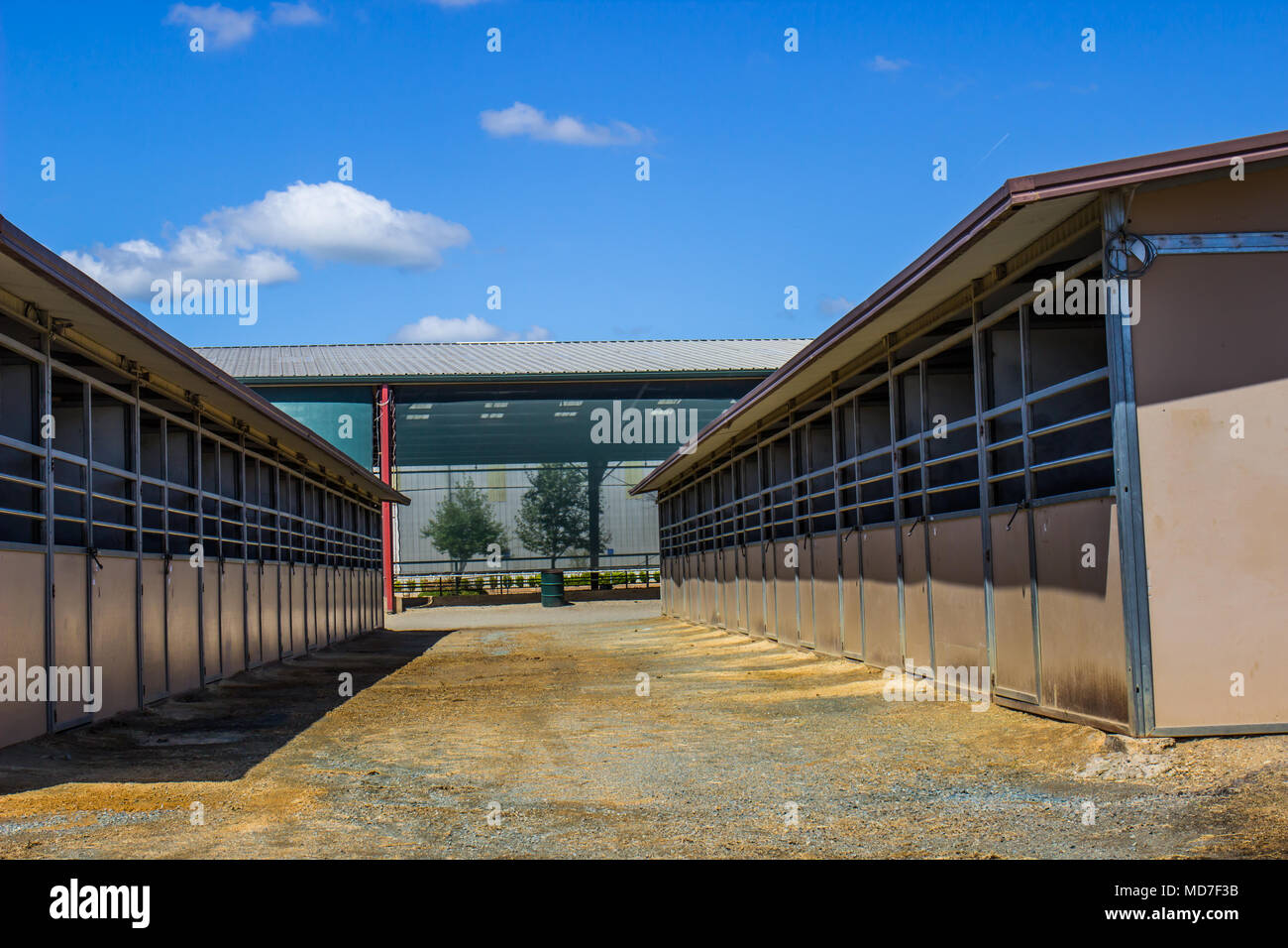 Row Of Horse Stables In Front Of Arena Stock Photo - Alamy