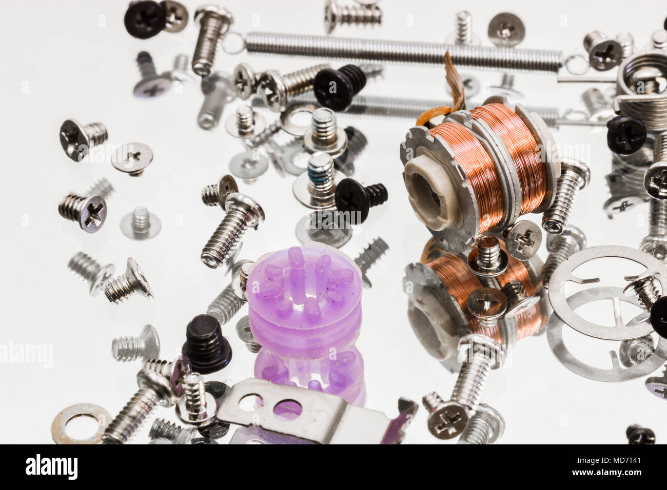 Large assortment of screws,bolts,spring,nuts and metallic objects found ...