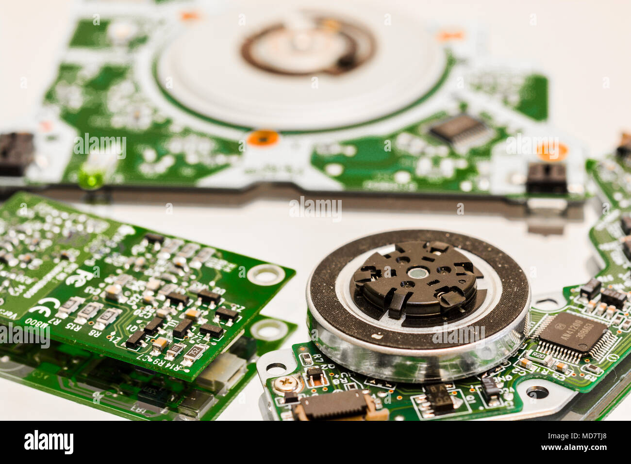 Close up of computer disc drive components showing printed microchip ...