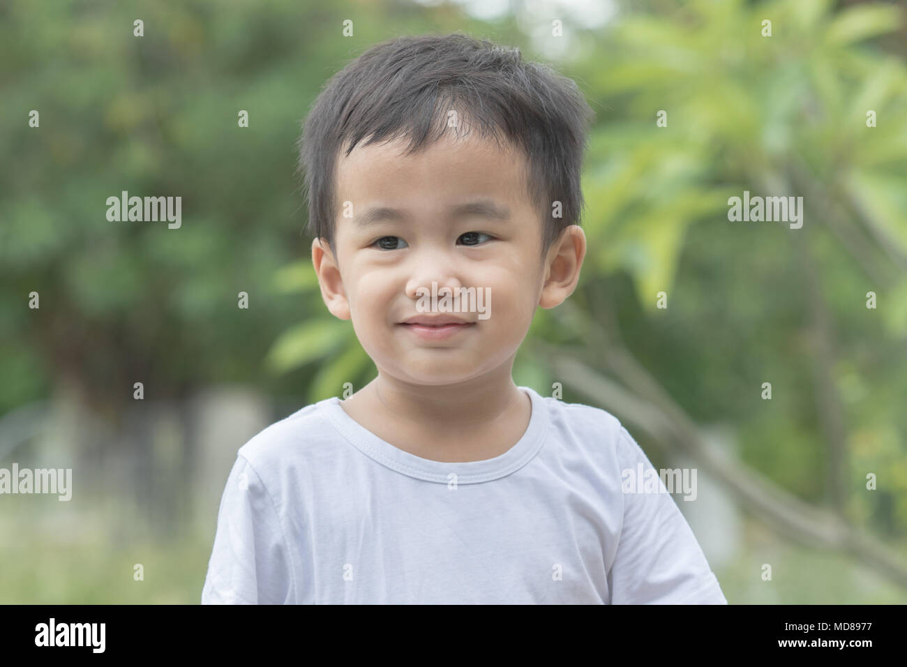face asian children smiling happiness emotion Stock Photo - Alamy