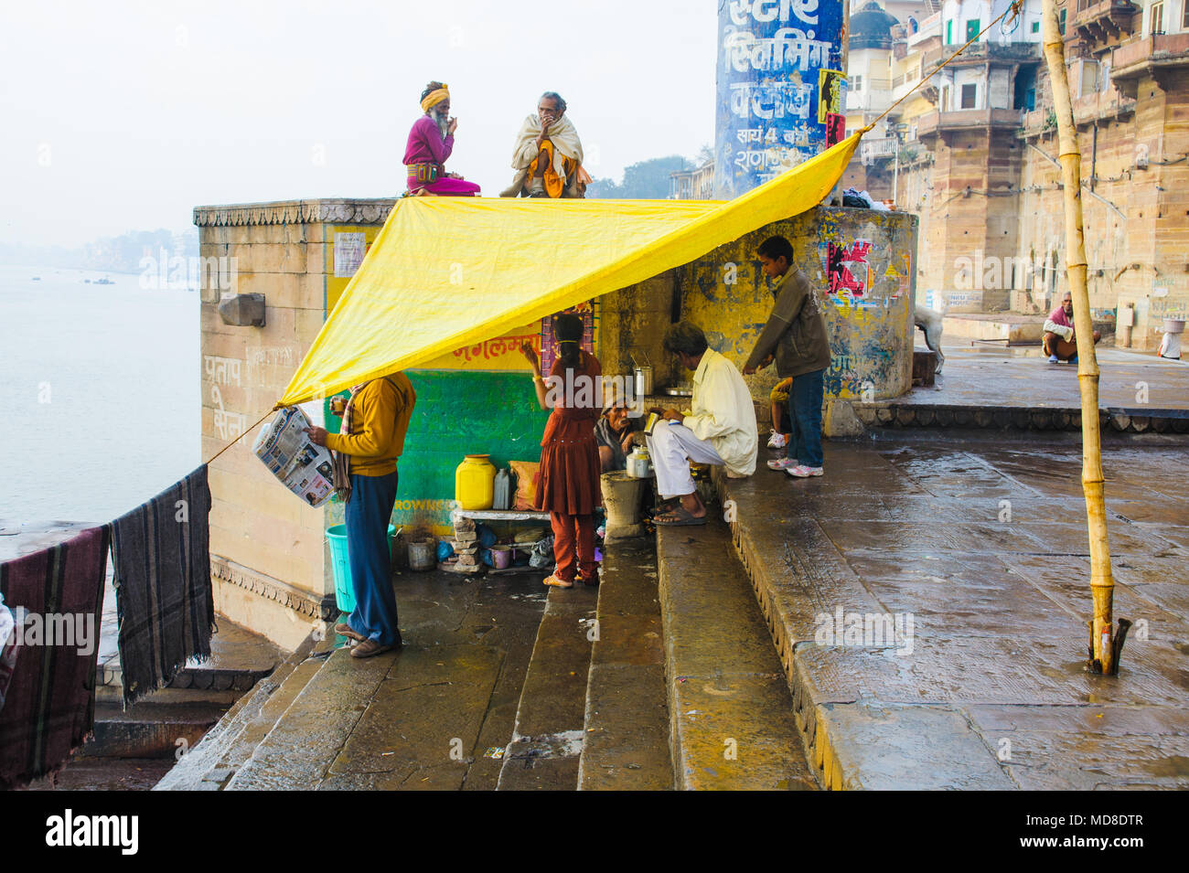 Chai stall sheltering from the rain on the ghats in Varanasi Stock ...