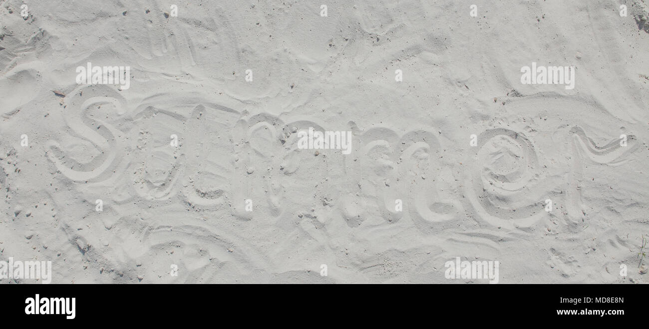 "Summer" written in the sand on the beach Stock Photo - Alamy