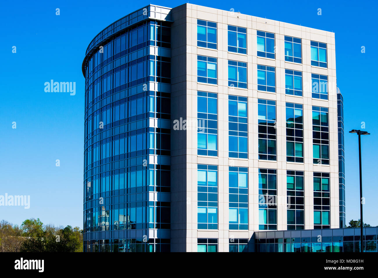Building facade in the bright blue sky Stock Photo - Alamy