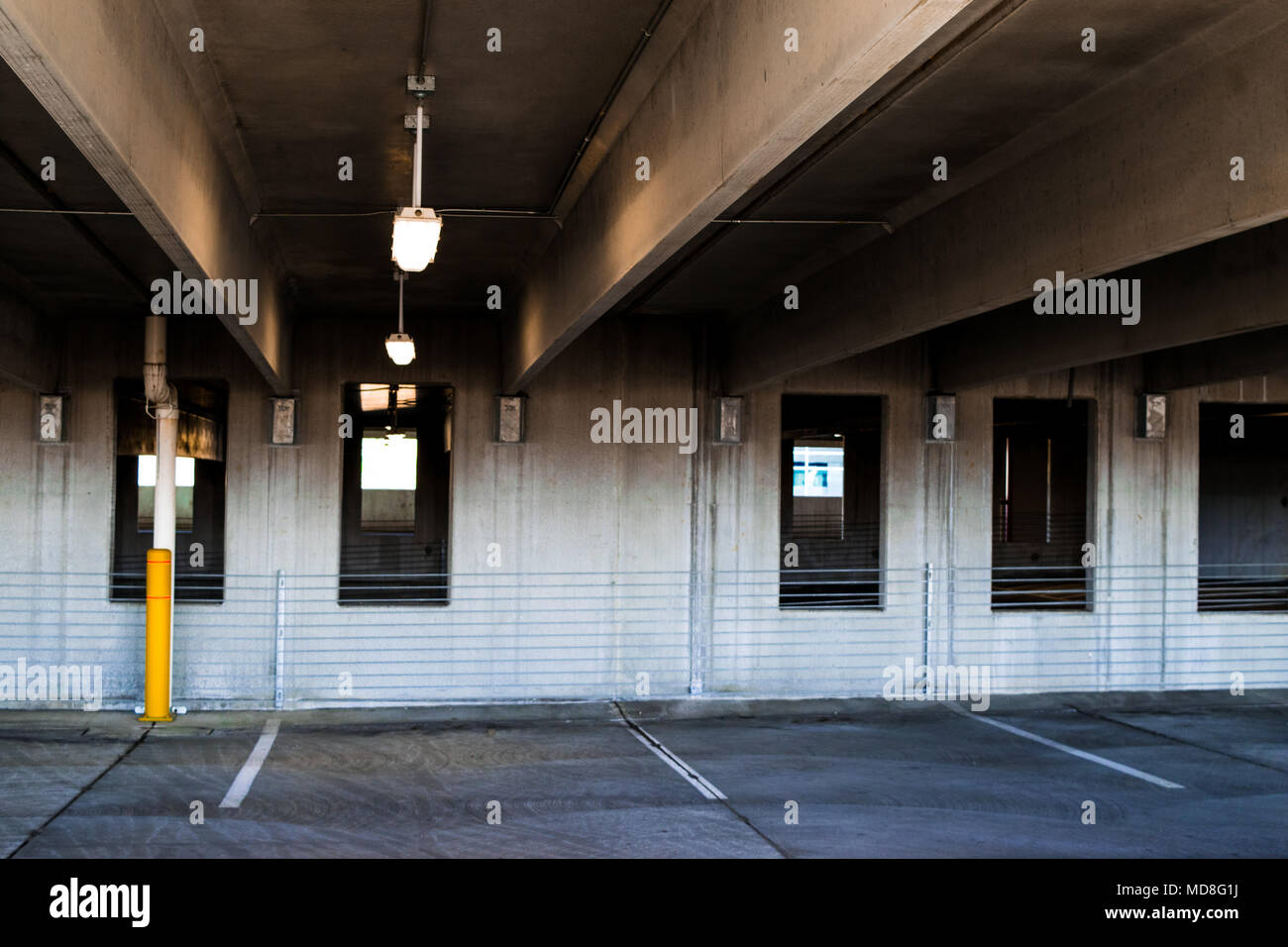 Dimly lit empty parking structure hi-res stock photography and images ...