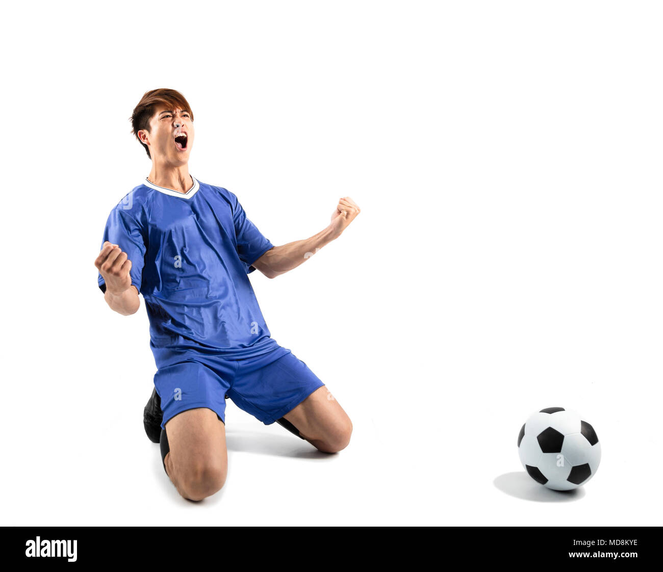 happy asian soccer player celebrating isolated on white Stock Photo - Alamy