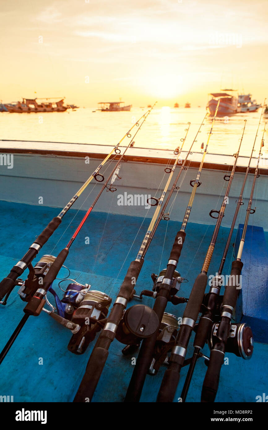stack of fishing rod on fishing boat Stock Photo - Alamy