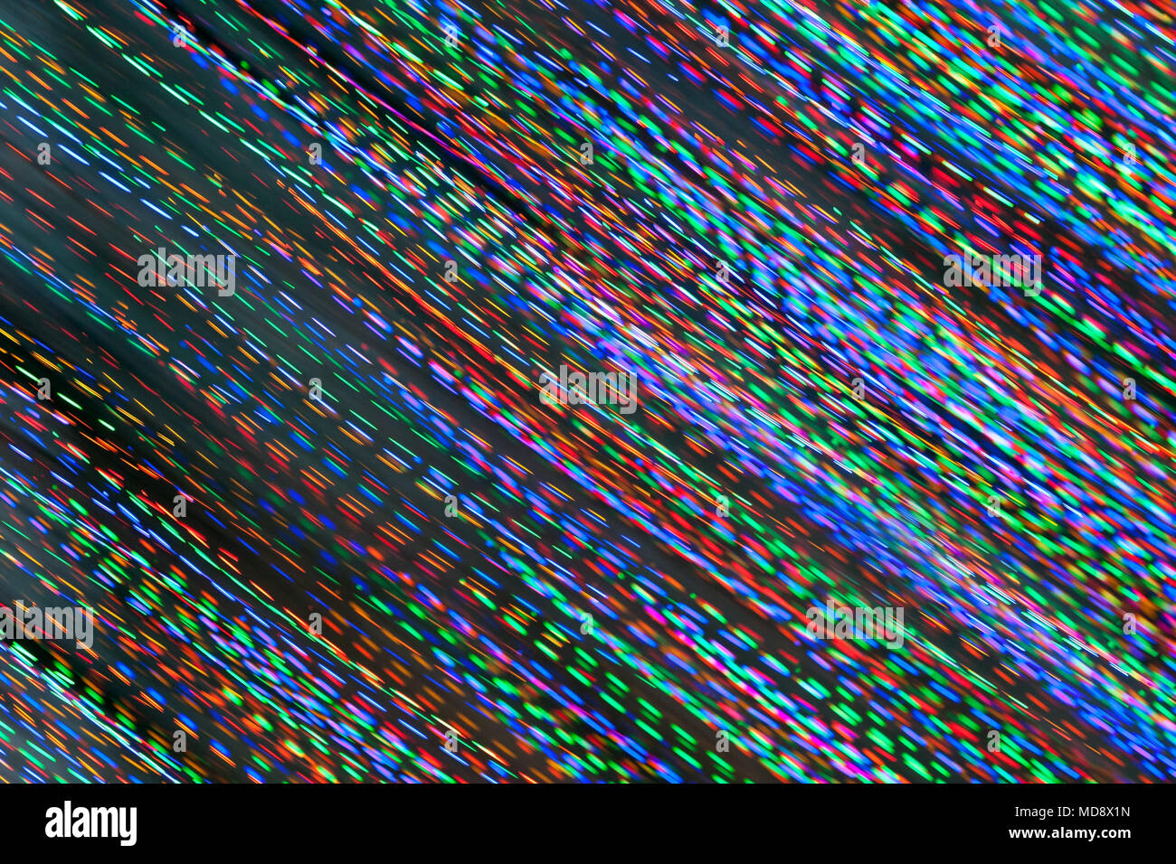 Pan of Colorful Holiday Lights Creates Abstract Diagonal Background ...