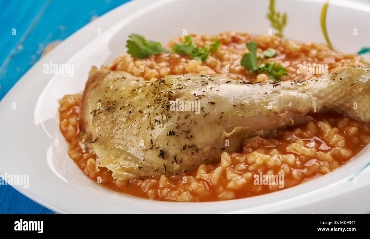 Dominican Locrio De Pollo - Dominican Style Chicken And Rice Stock ...