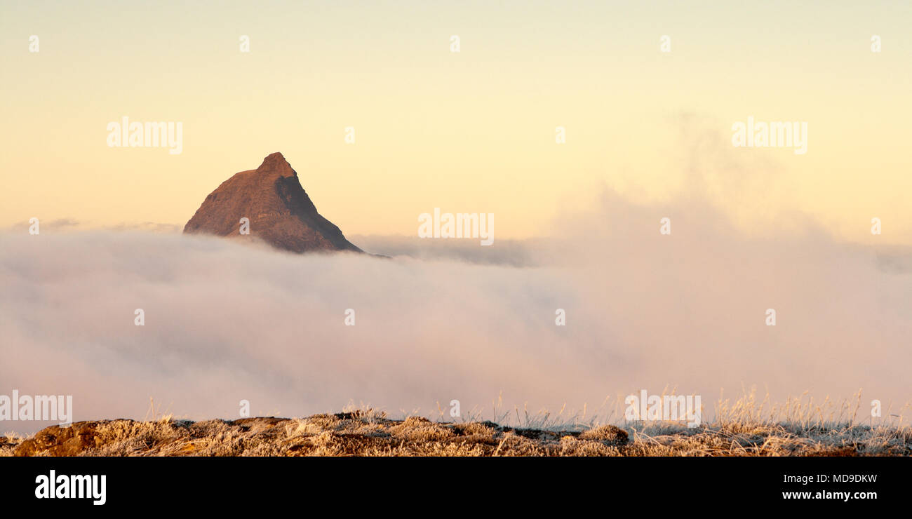 Looking at the Assynt Mountains at Sunrise on a frosty mountain as they ...