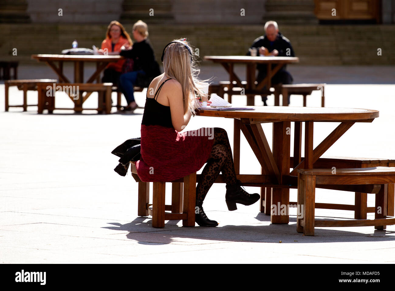 Reaching across table hi-res stock photography and images - Alamy