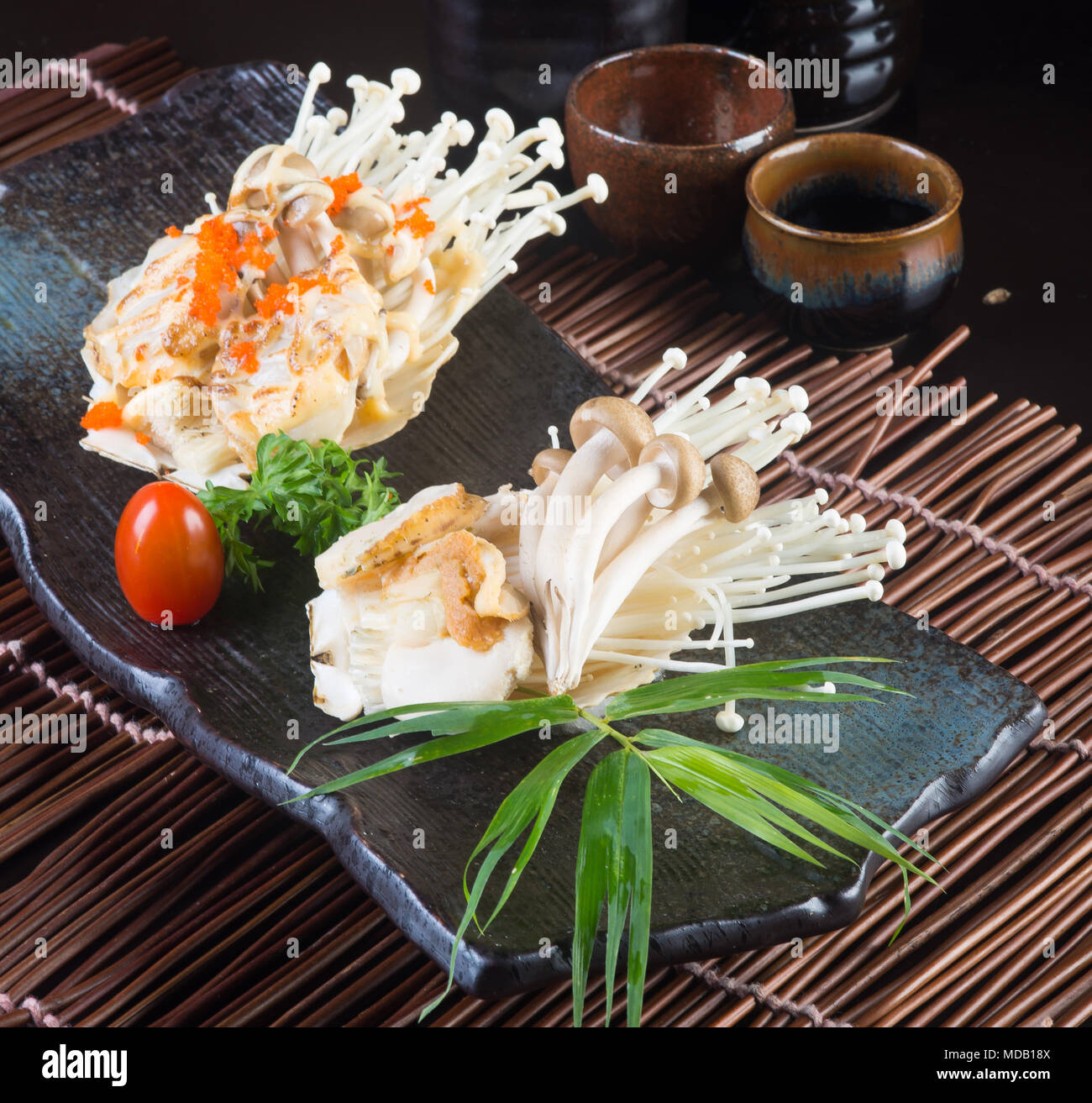 japanese cuisine. grilled shell fish on background Stock Photo - Alamy