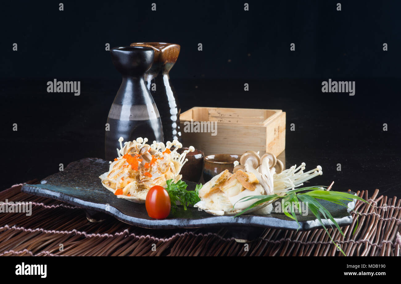japanese cuisine. grilled shell fish on background Stock Photo - Alamy