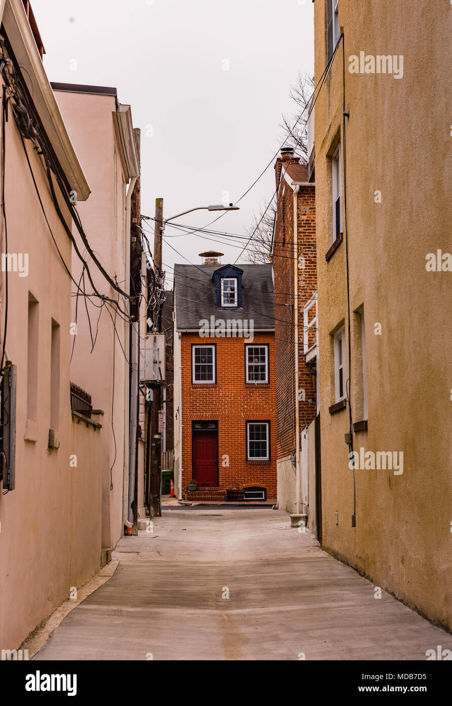 Baltimore, Maryland, USA. Red door on little house at end of alley in ...