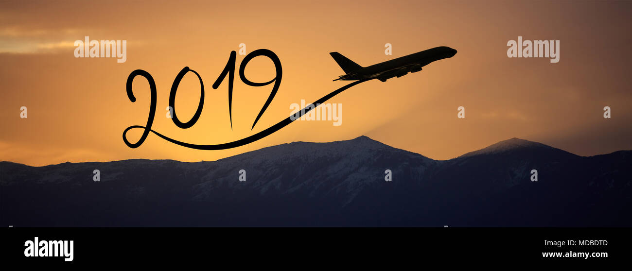 New year 2019 drawing by flying airplane on the air at sunrise, banner ...
