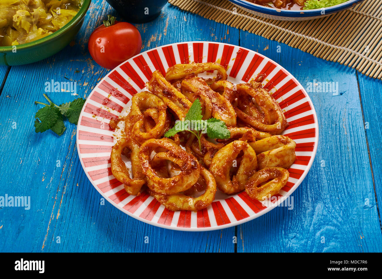 Indian cuisine . Kerala Style Kanava - Squid Roast, Traditional ...